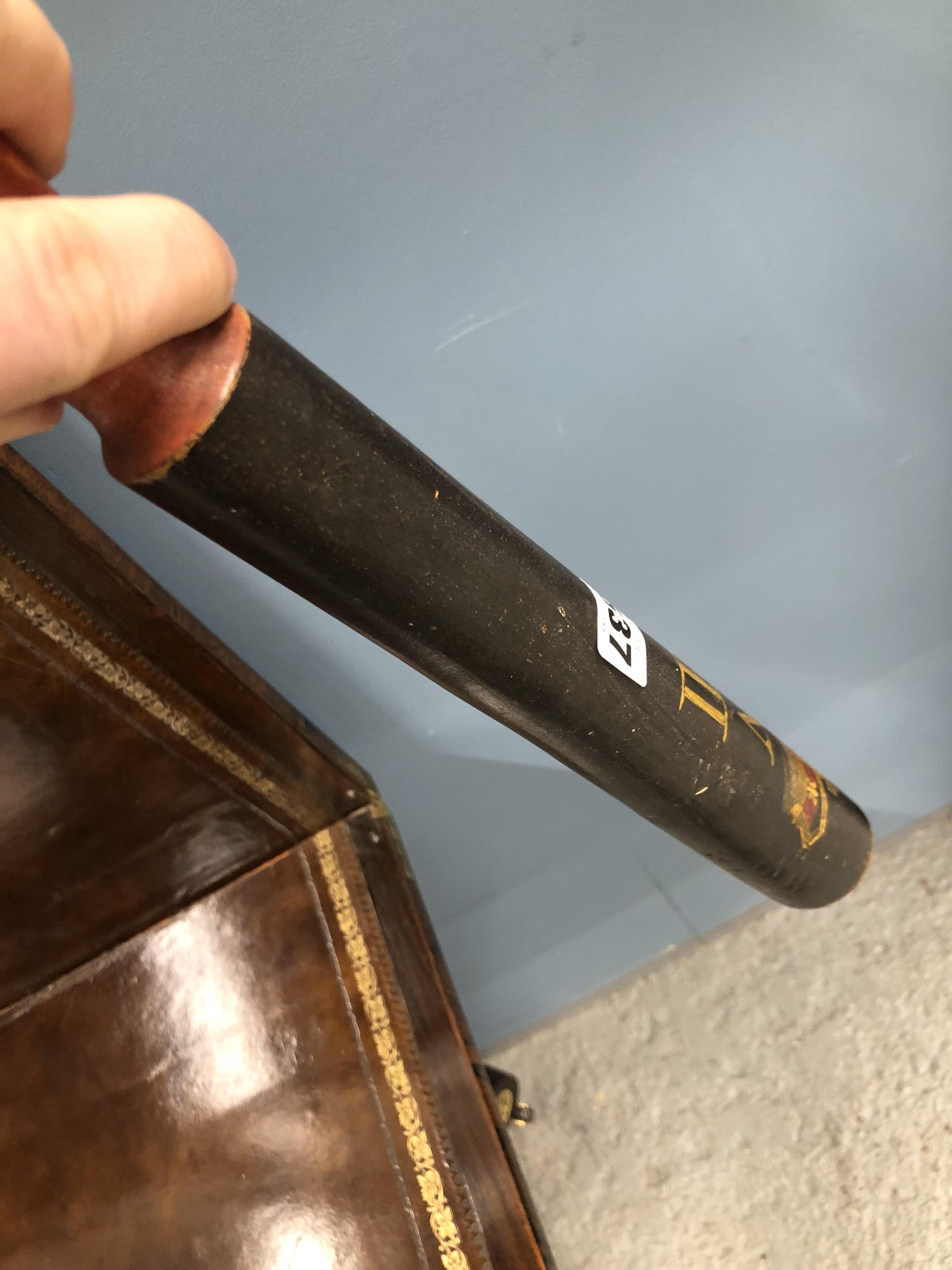 A William III truncheon, the black ground painted with his crowned cypher