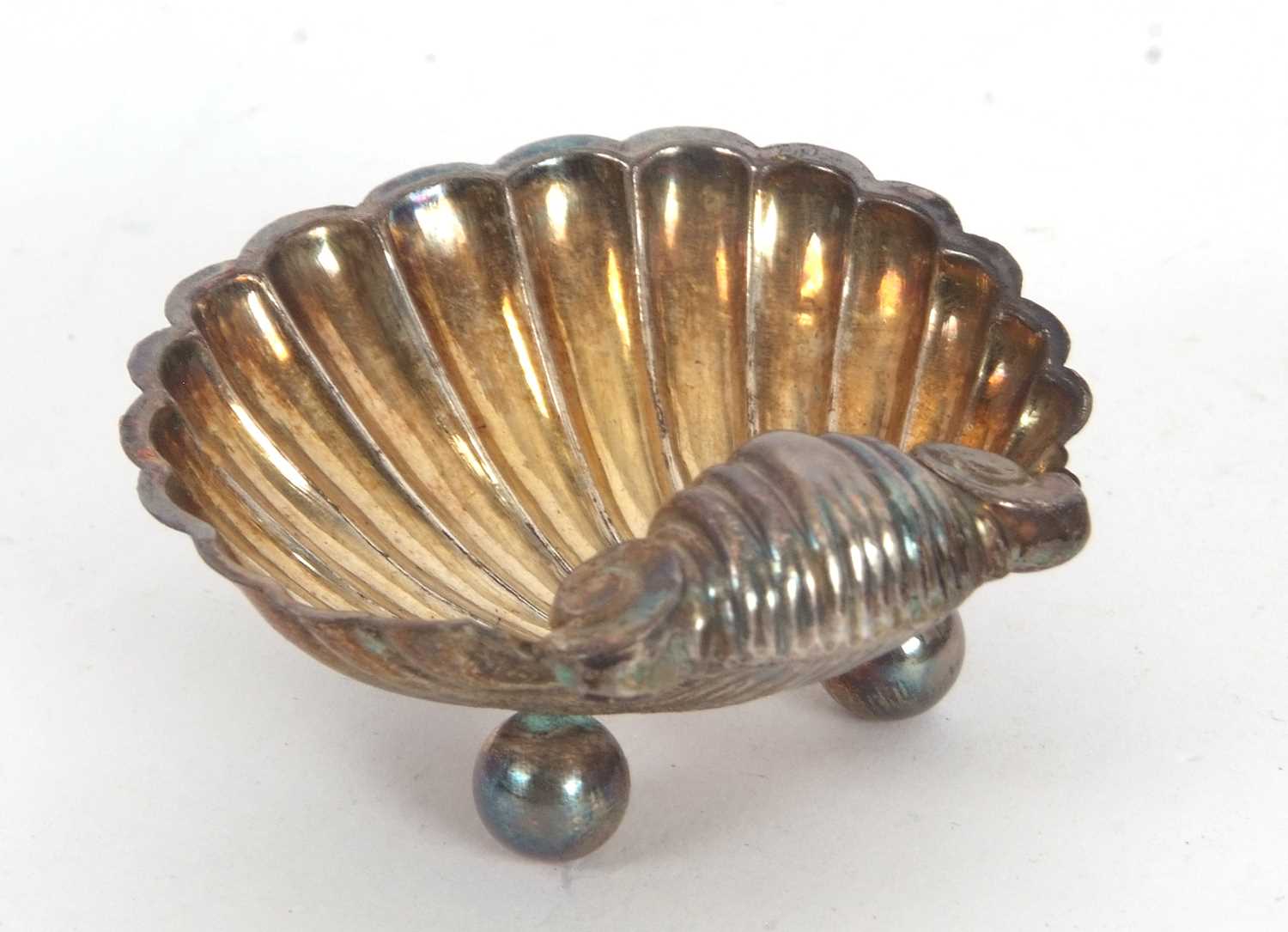 A cased Victorian set of four shell shaped salts, hallmarked for ...