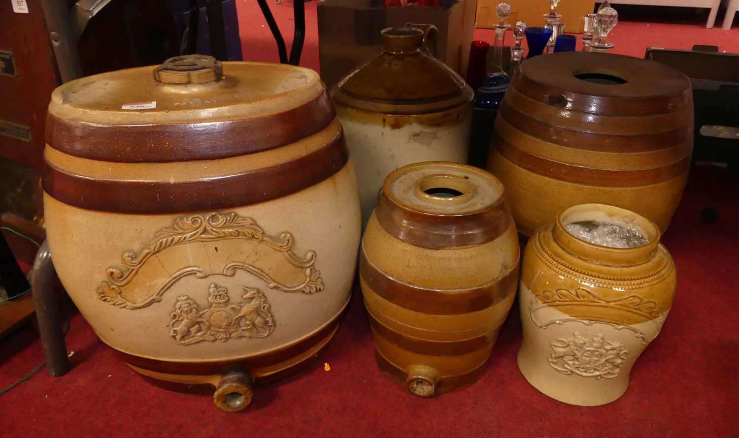 A collection of stoneware jars and flagons, to include R Miller & Son ...