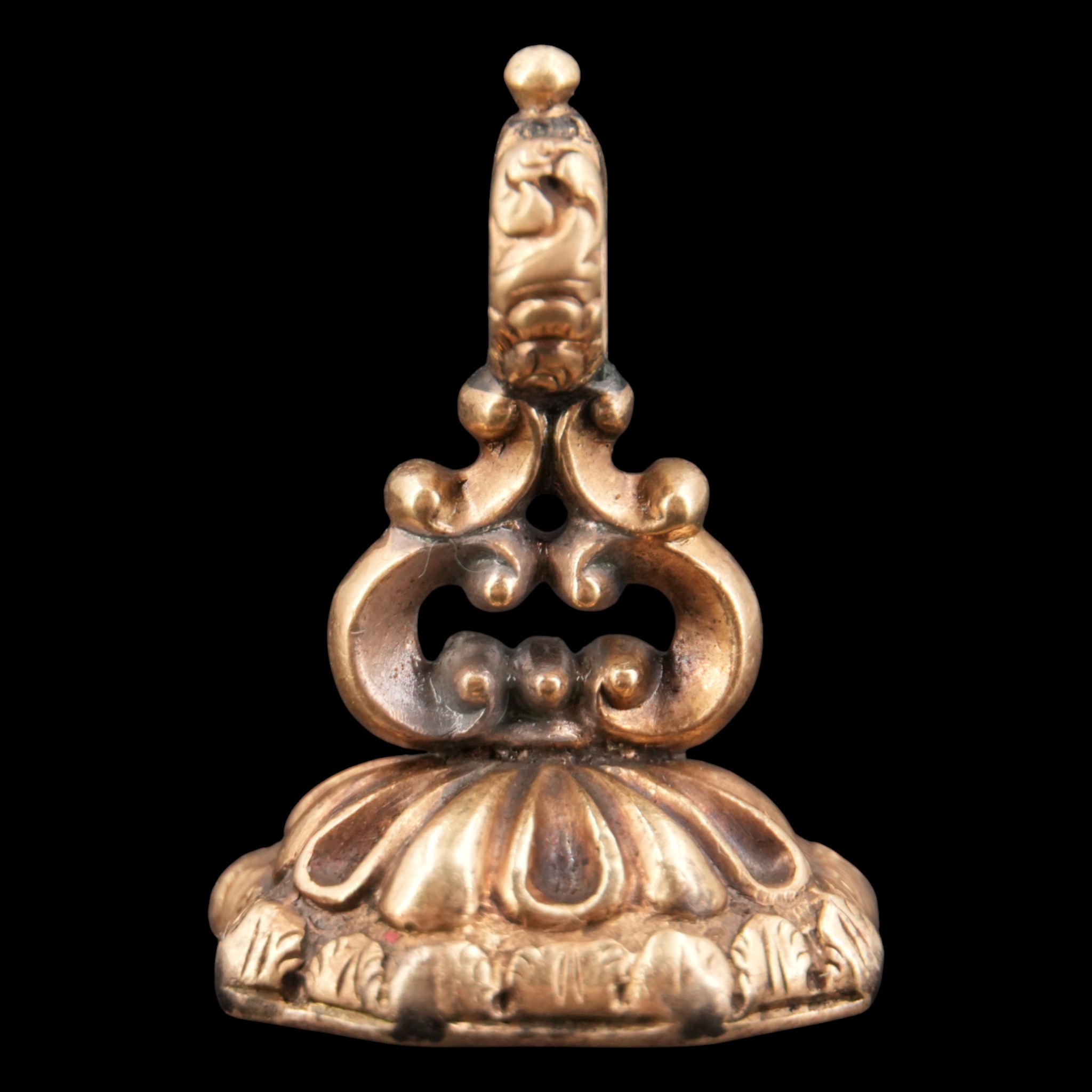A late 19th Century gold watch chain fob seal breloque, having an ...