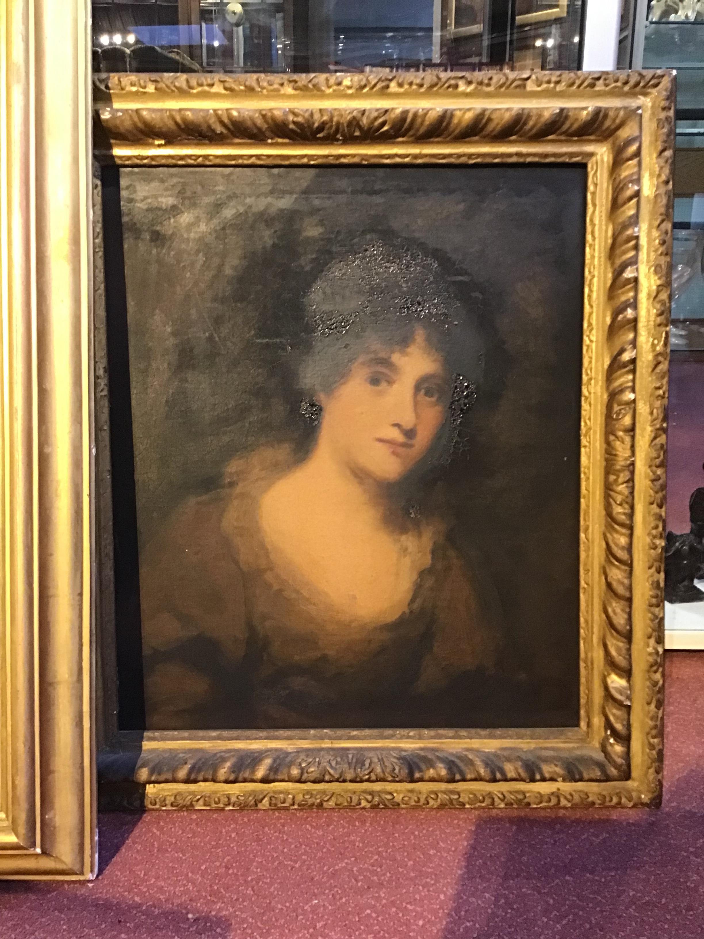 Circle of George Romney (1734-1802) Portrait of a lady, half length ...