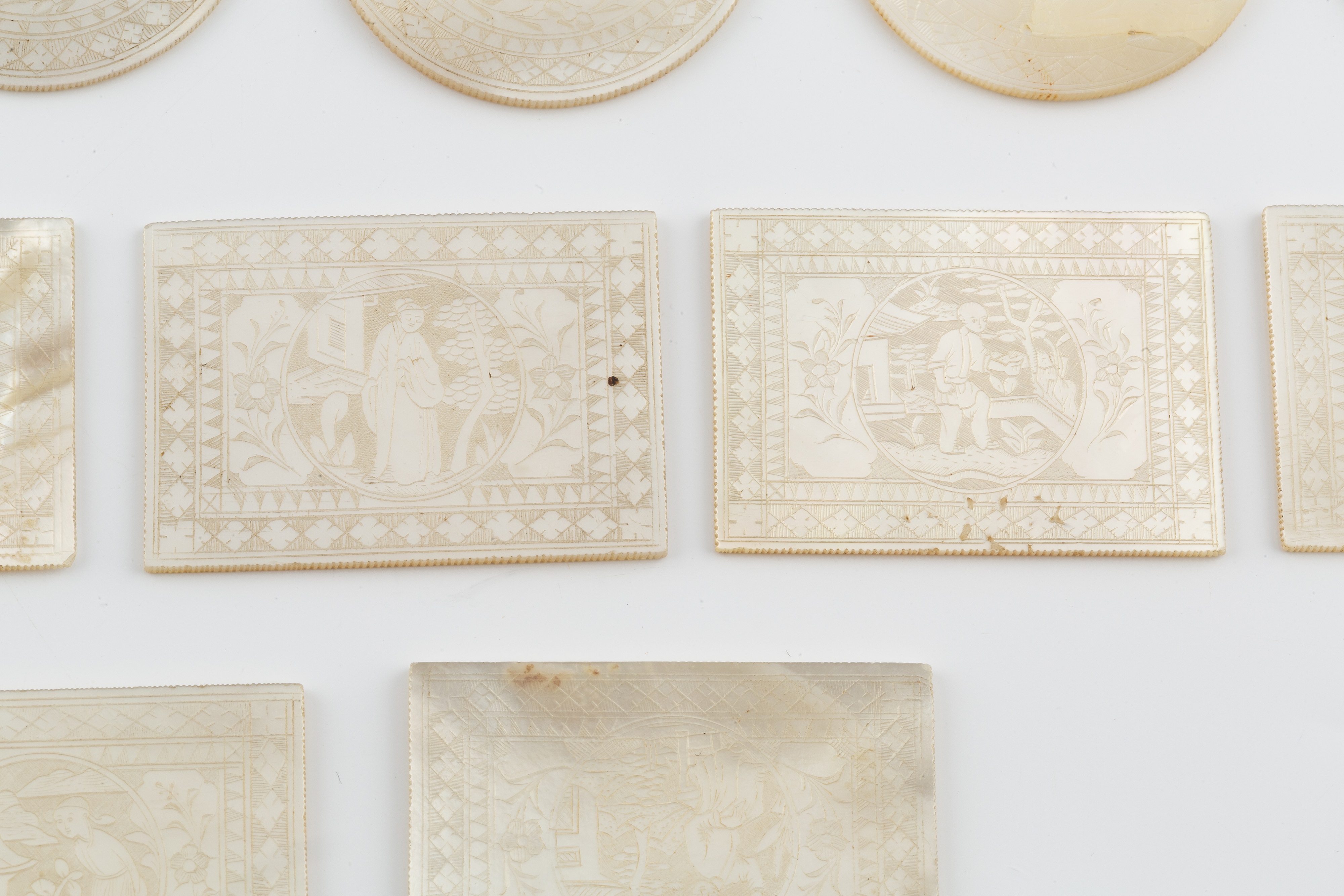 A collection of 19th century Chinese mother of pearl gaming counters ...