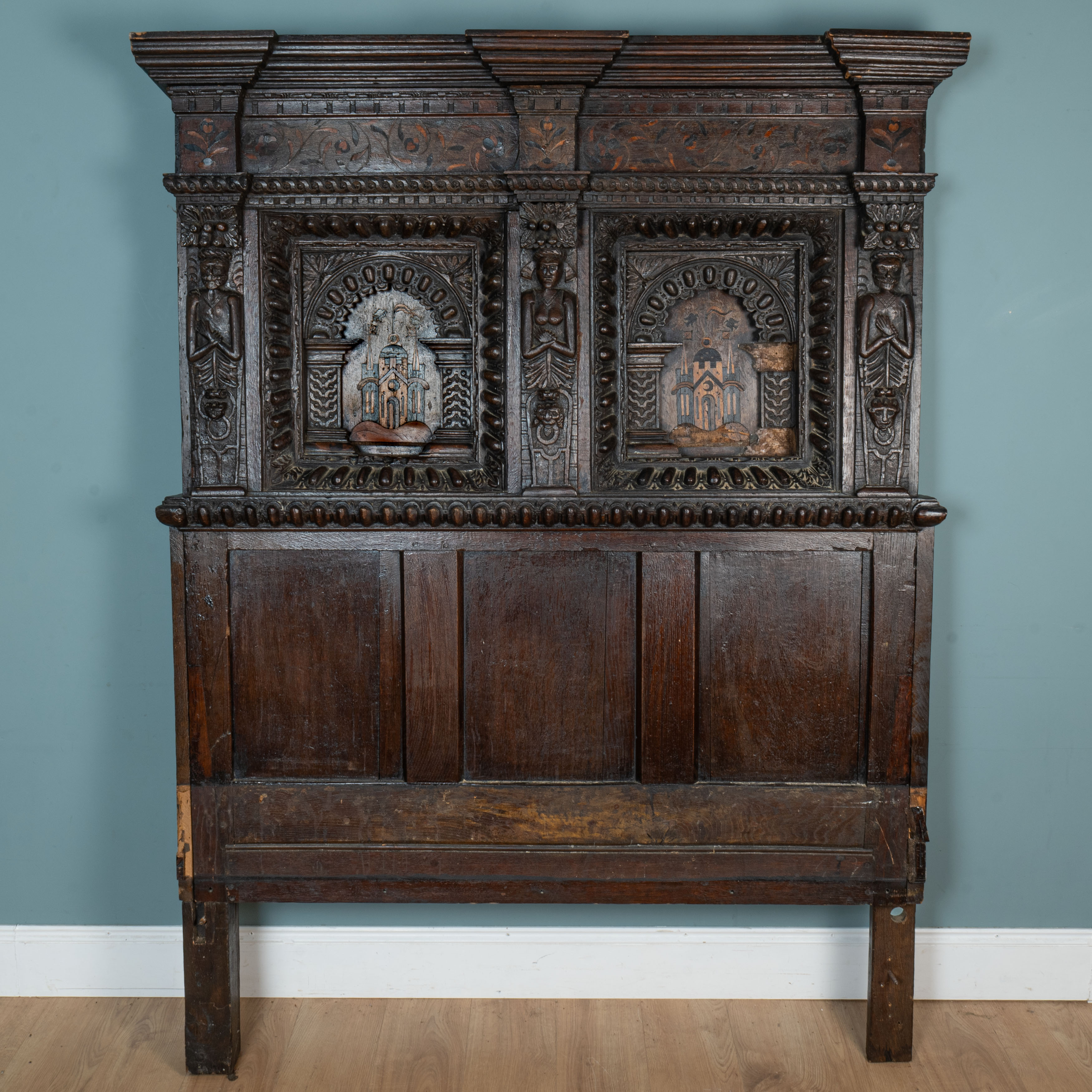 A 16th century and later tester bed The panelled canopy with carved ...