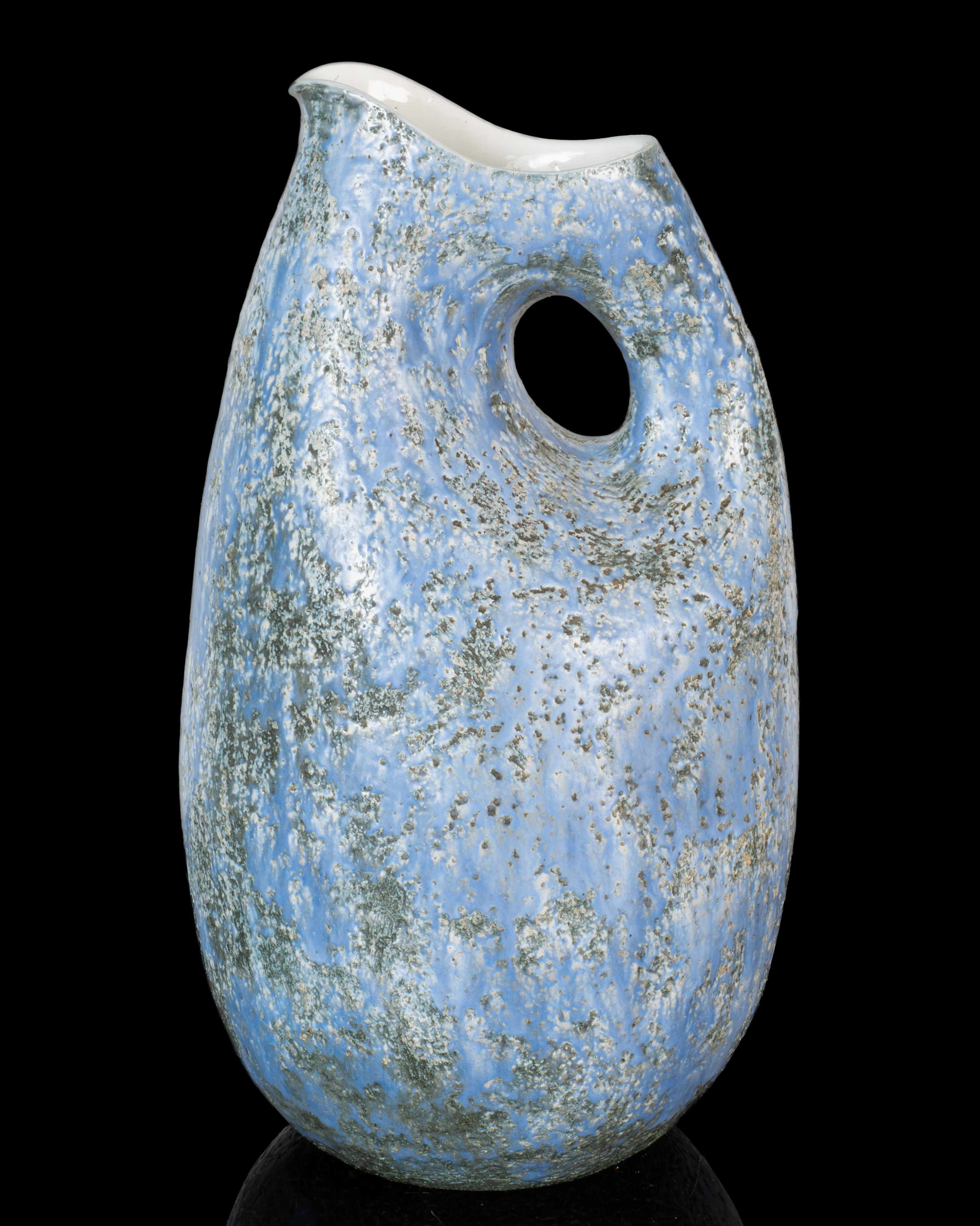 A 1970s German jug A "Fat Lava" violet pottery jug. 50cm high Qty: 1 A ...