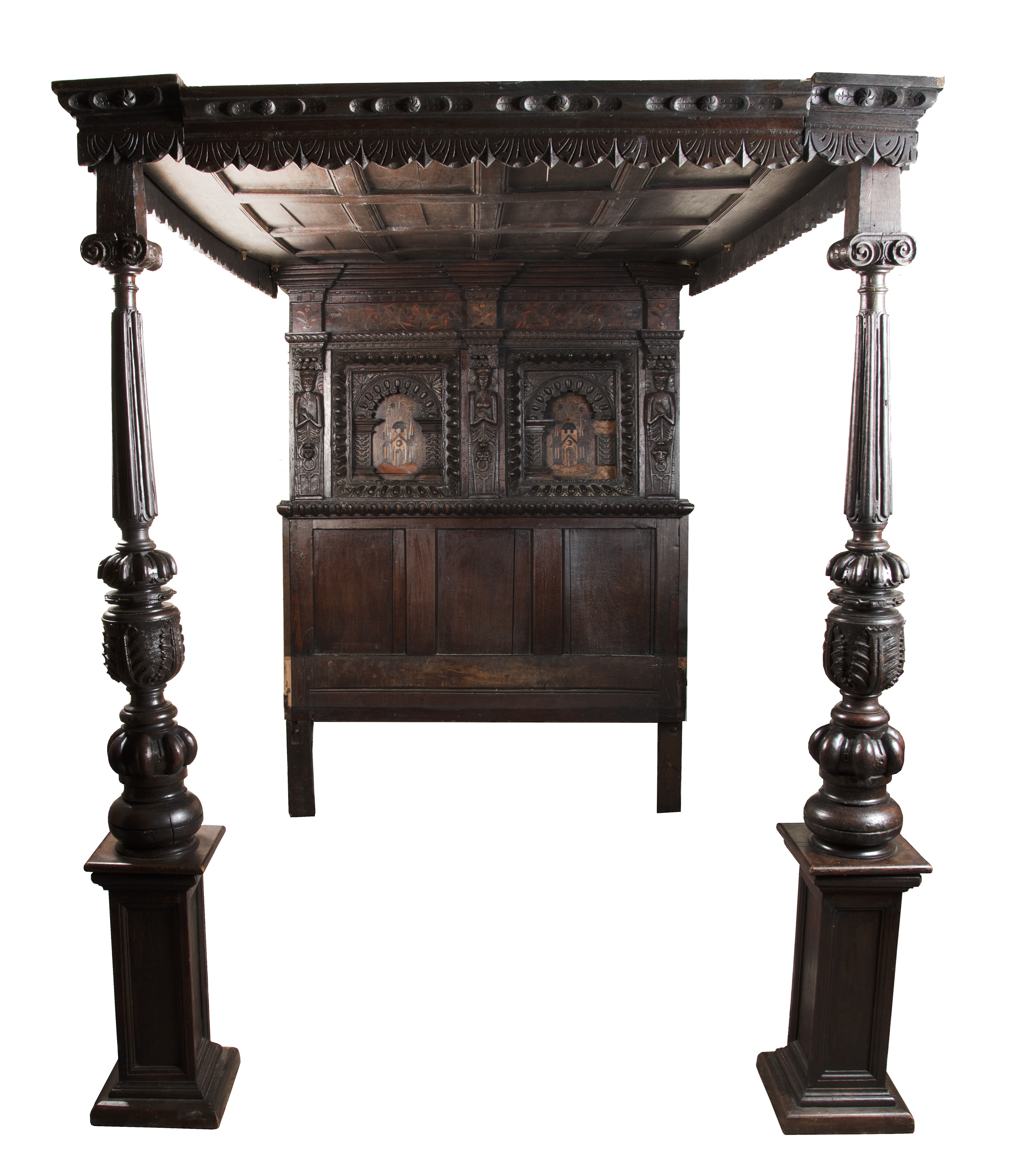 A 16th century and later tester bed The panelled canopy with carved ...