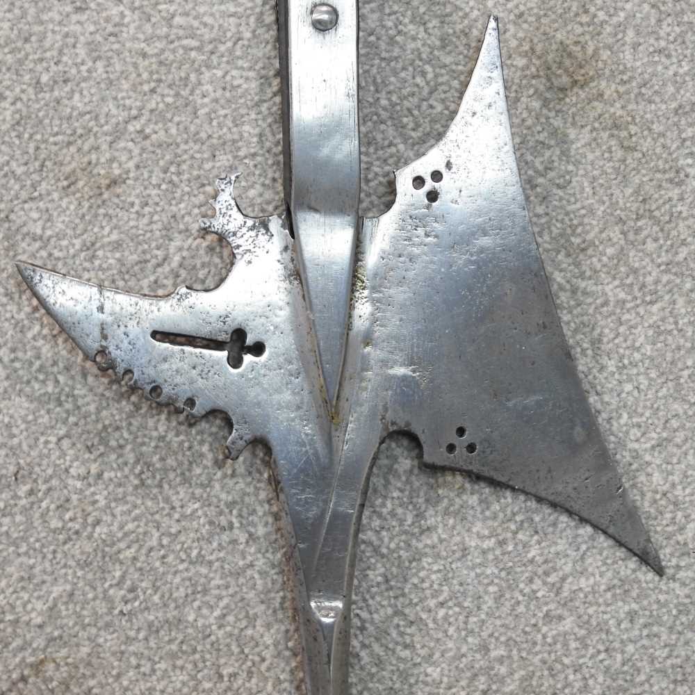 A 19th century continental halberd, with a typical crescent shaped ...