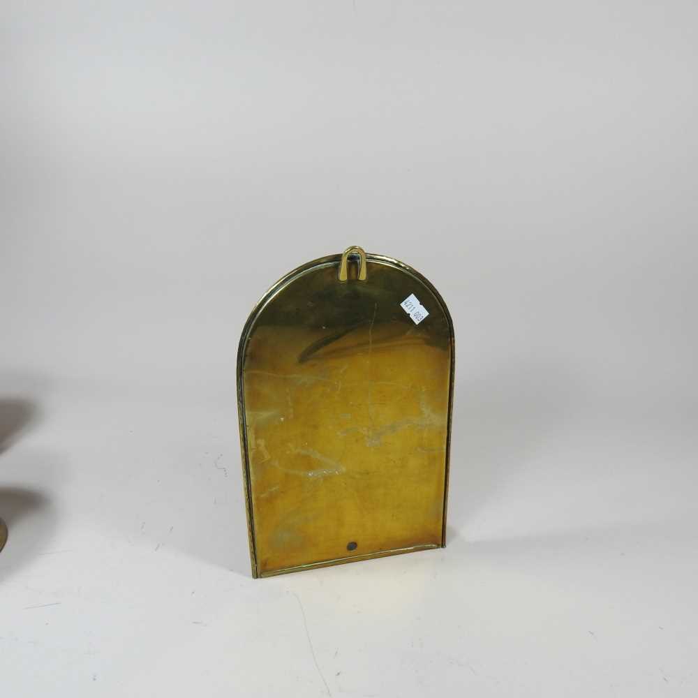 A brass ship's clock, together with a brass candle sconce, set of ...