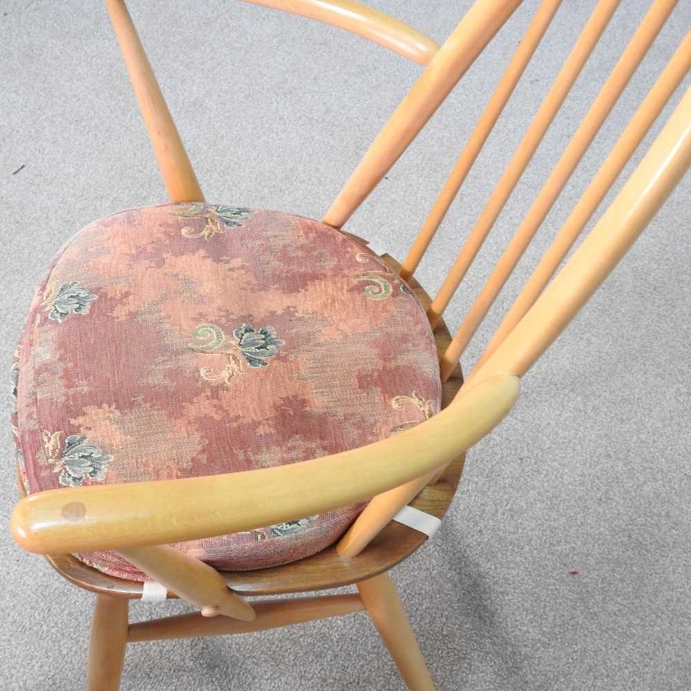 A pair of 1970s Ercol light elm hoop back armchairs (2)