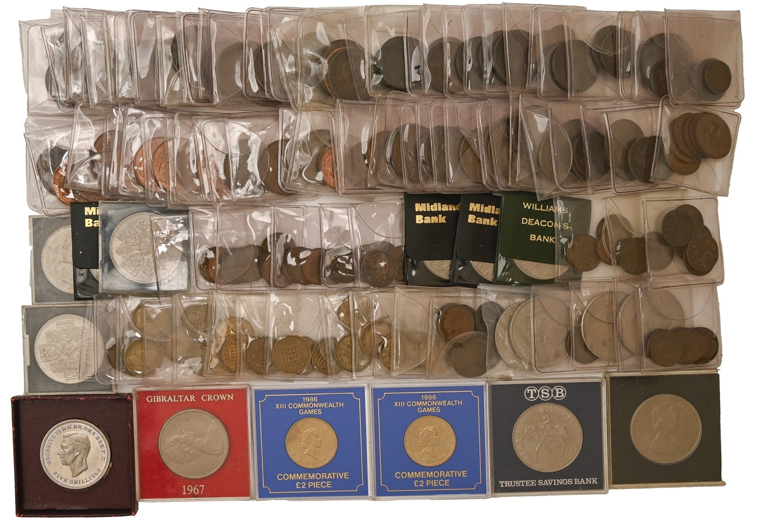 Coins. Base metal, in three boxes
