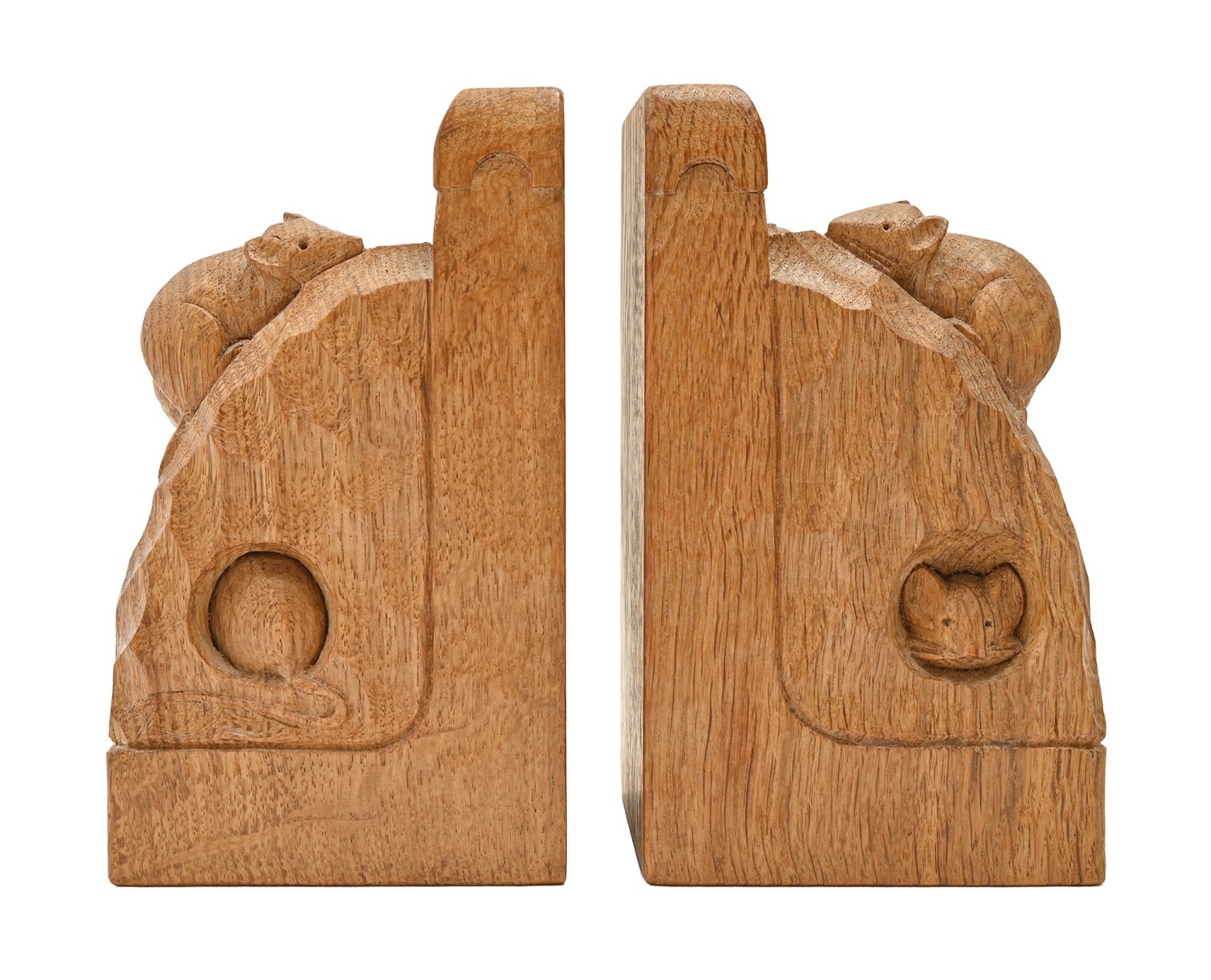 A pair of Robert 'Mouseman' Thompson bookends, c1980, of adzed and ...