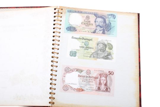 A large collection of assorted 20th century world banknotes in three ...