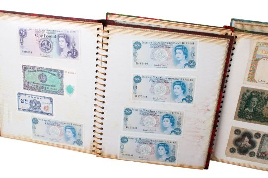 A large collection of assorted 20th century world banknotes in three ...
