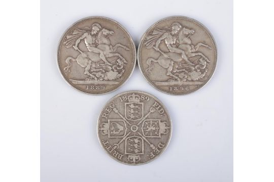 Three Victorian silver coins to include two full crowns and one florin ...