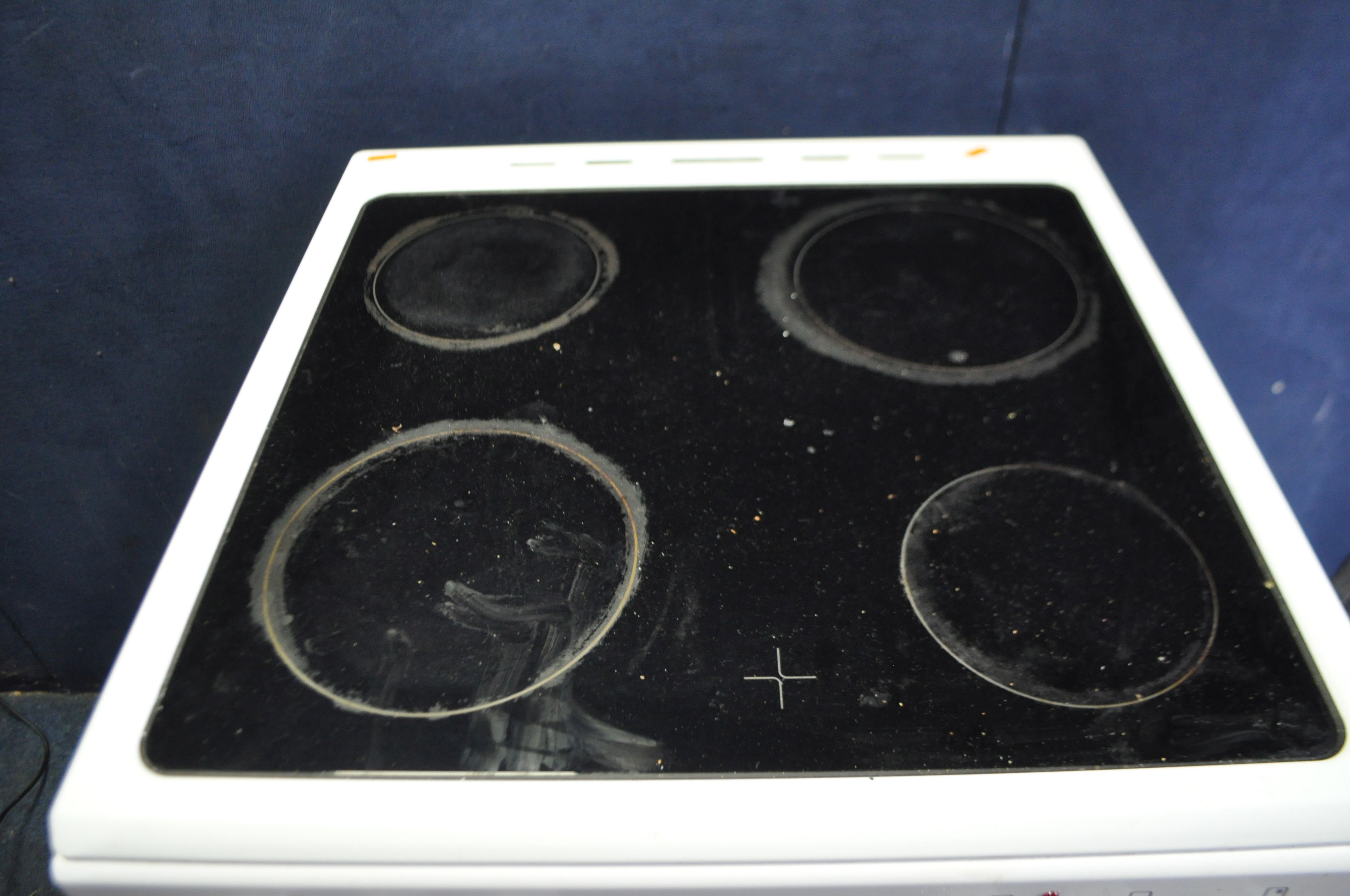 A LOGIK ELECTRIC COOKER with ceramic hob, width 60cm, depth 64cm ...