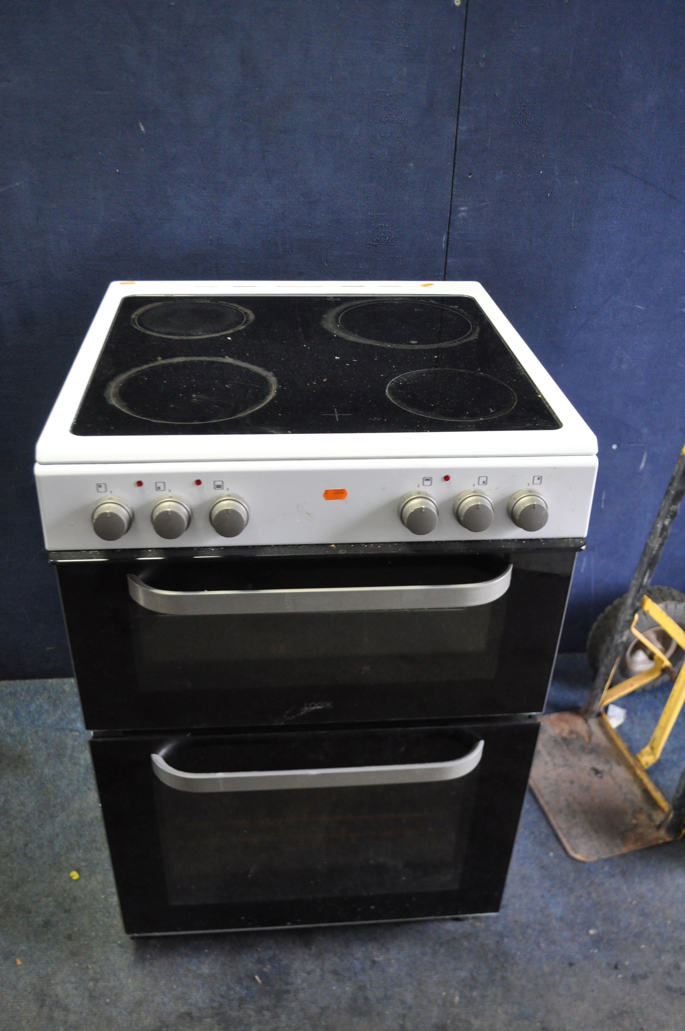 A LOGIK ELECTRIC COOKER with ceramic hob, width 60cm, depth 64cm ...