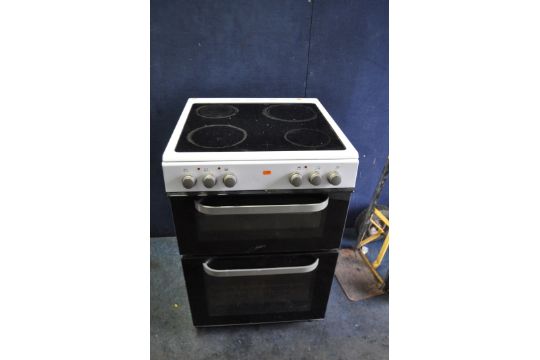 A LOGIK ELECTRIC COOKER with ceramic hob, width 60cm, depth 64cm ...