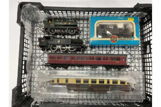A Lima 00 gauge GWR diesel railcar, with three tank engines: a boxed ...