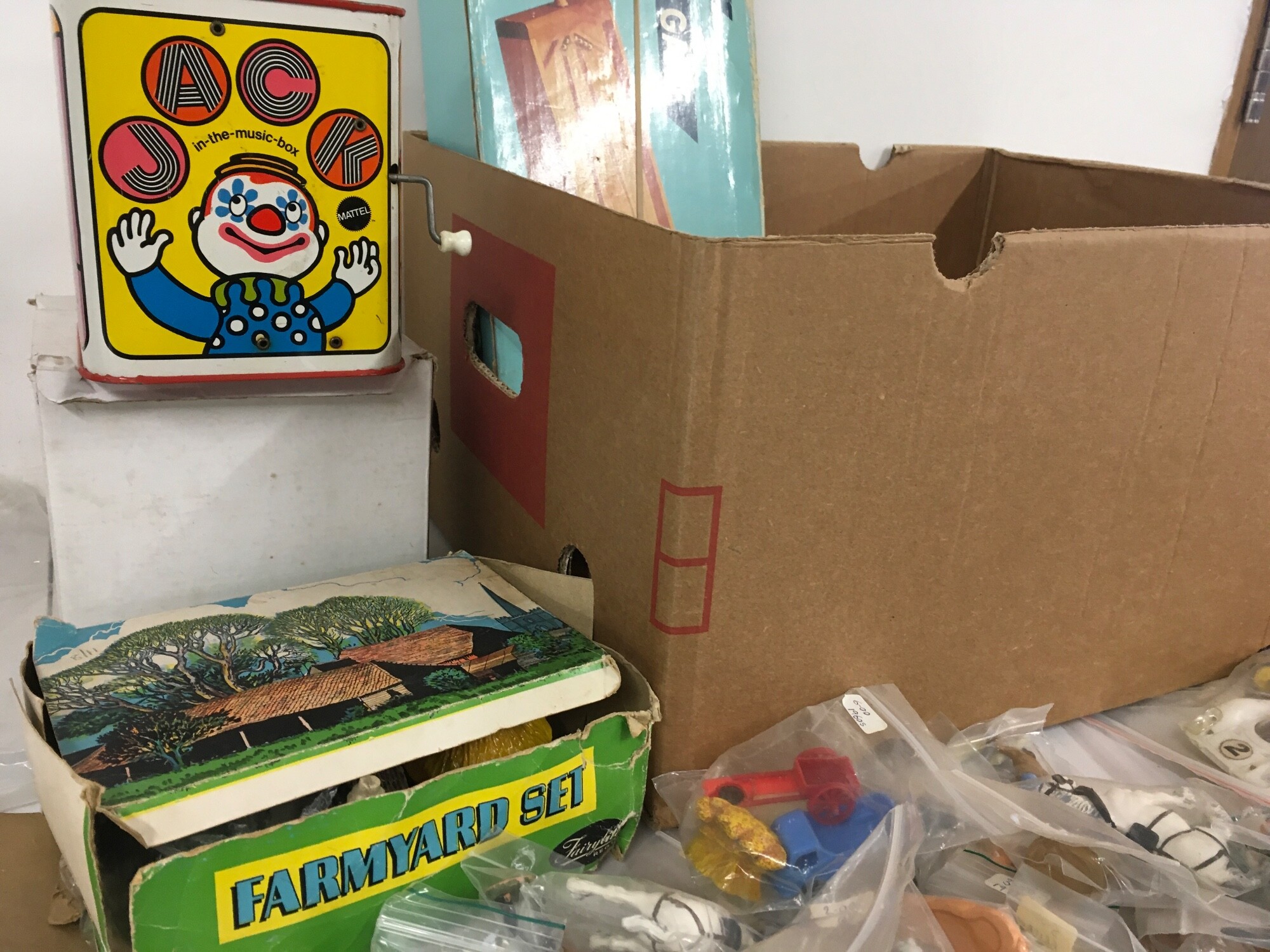 A mixed collection includes Britains figures, Fairylite farmyard set ...
