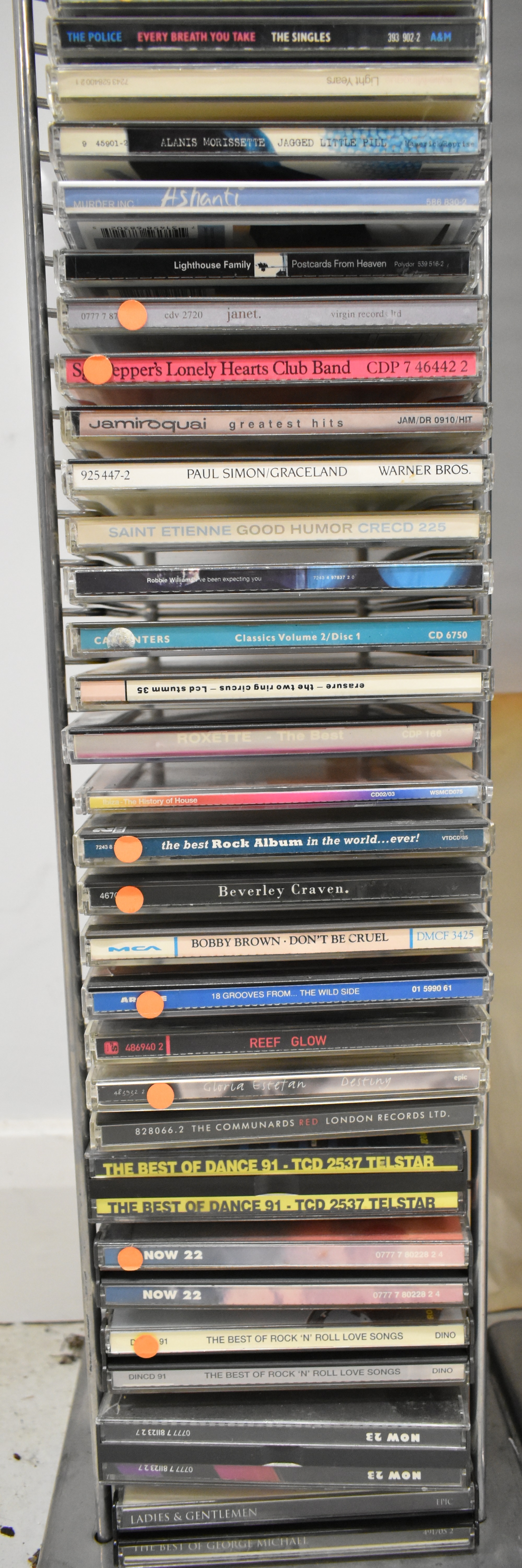 Three vintage stainless steel CD storage towers each capable of holding ...