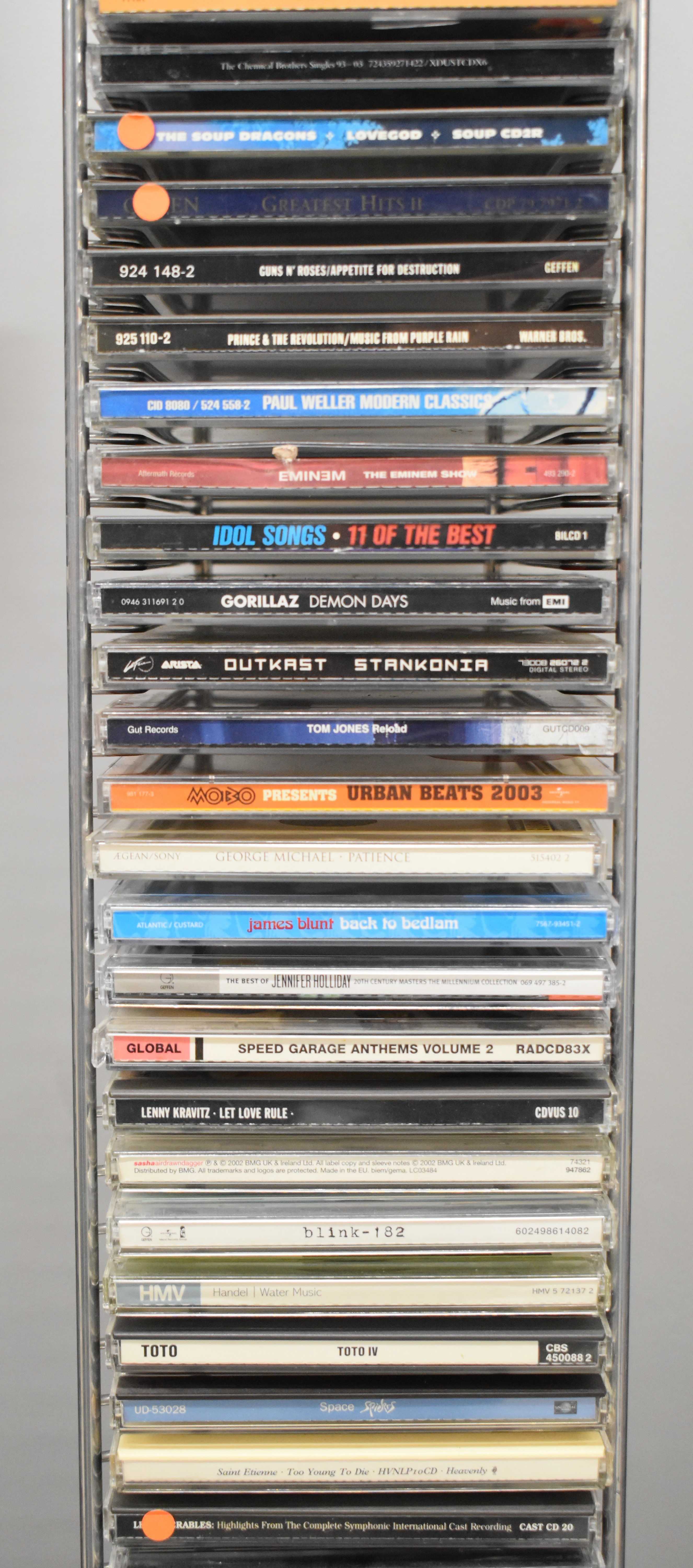 Three vintage stainless steel CD storage towers each capable of holding ...