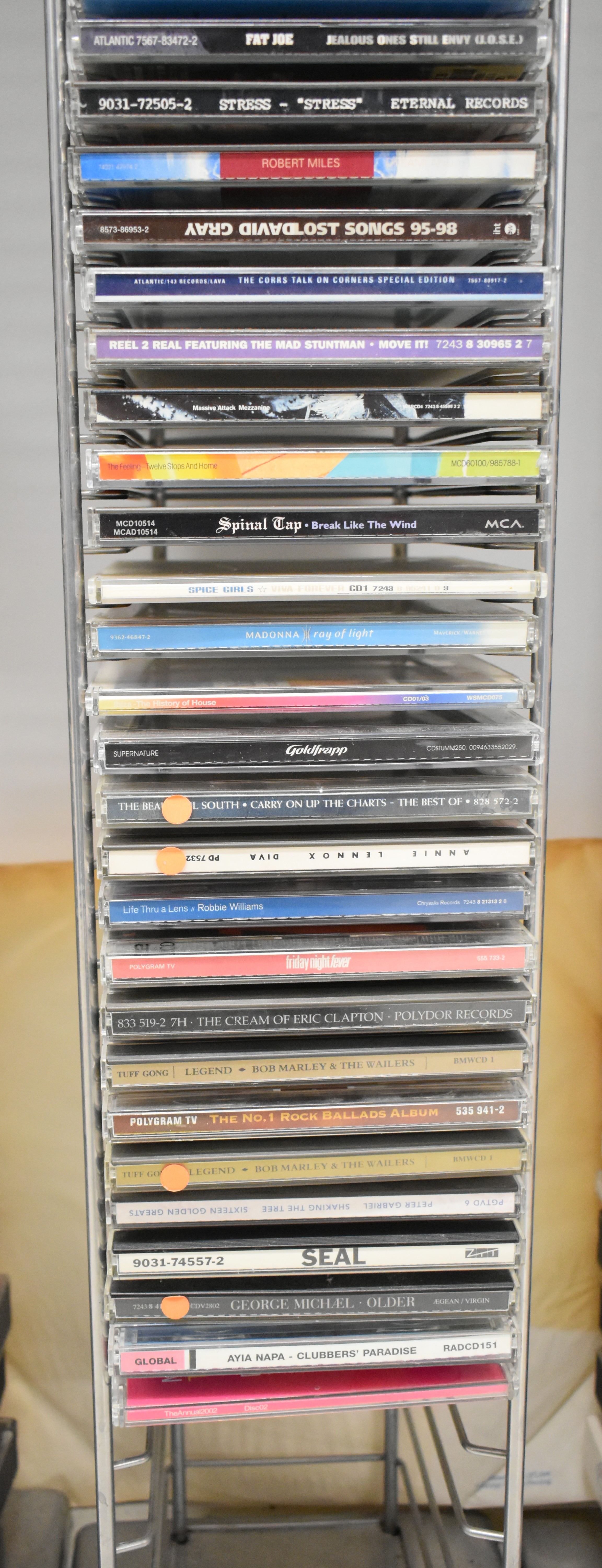 Three vintage stainless steel CD storage towers each capable of holding ...