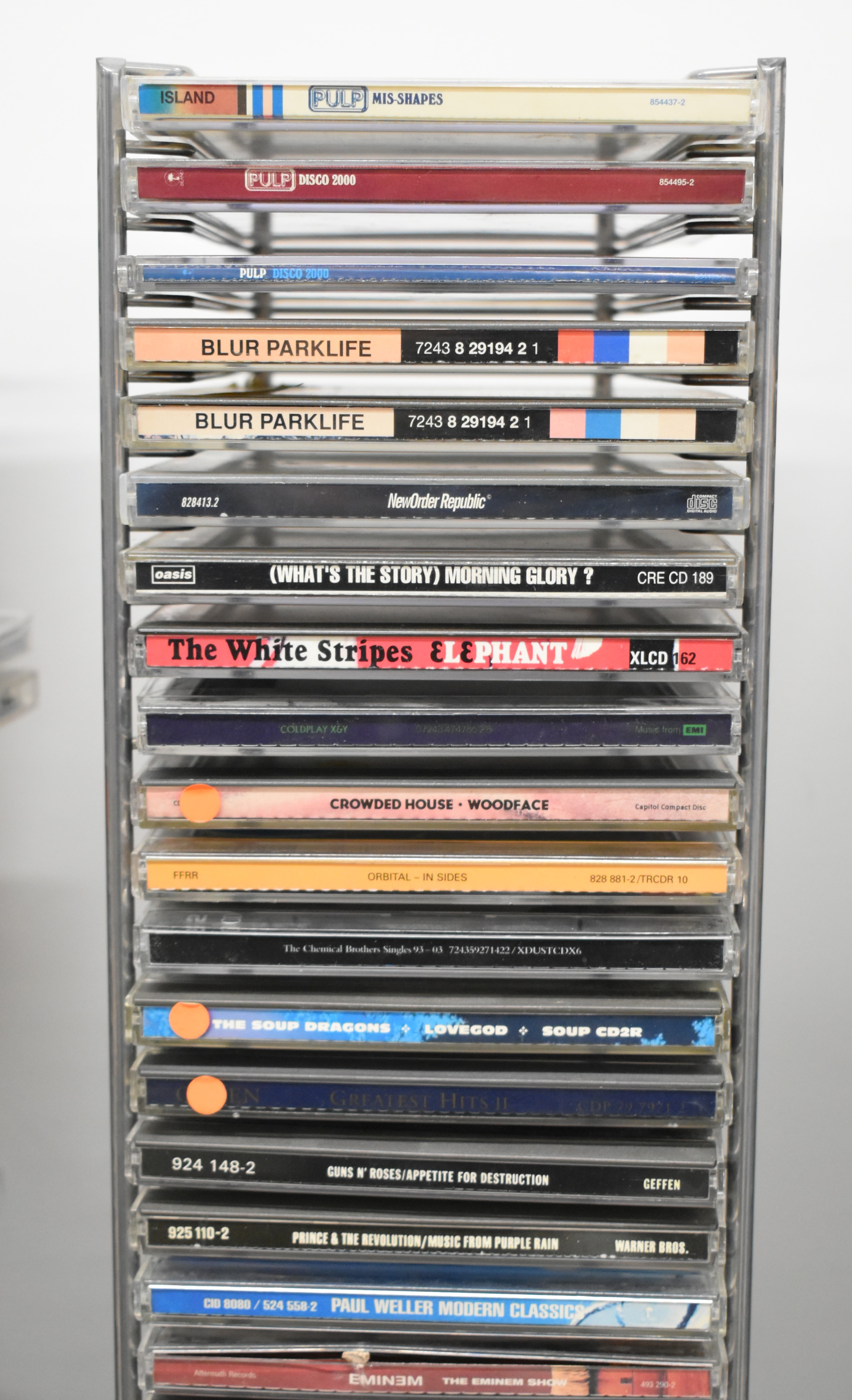 Three vintage stainless steel CD storage towers each capable of holding ...