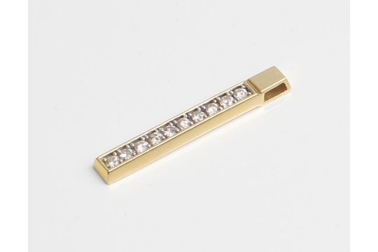 An 18ct yellow gold and diamond knife blade pendant - London import ...
