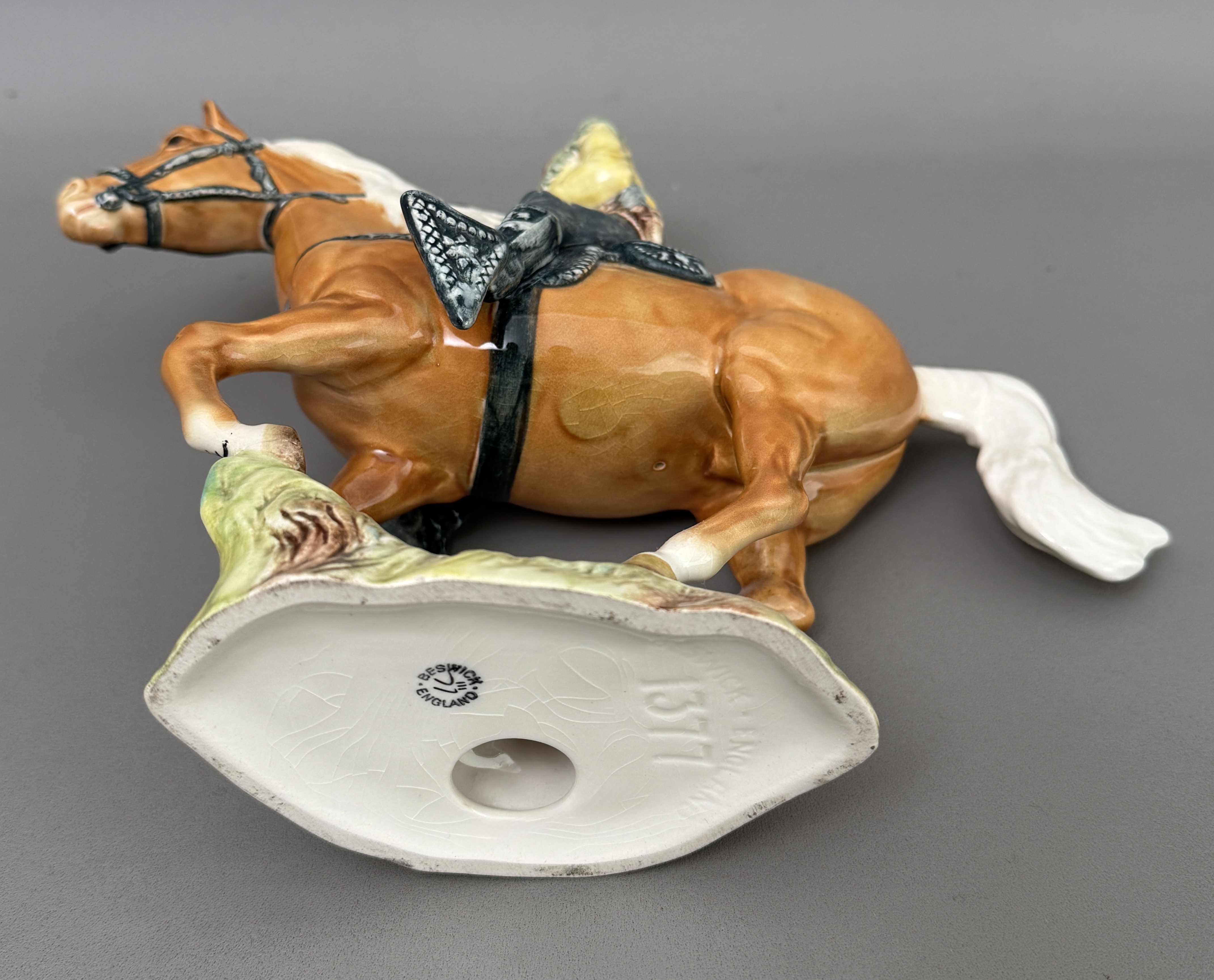 A Beswick figure of a Cowboy mounted on a palomino horse, model 1377 ...