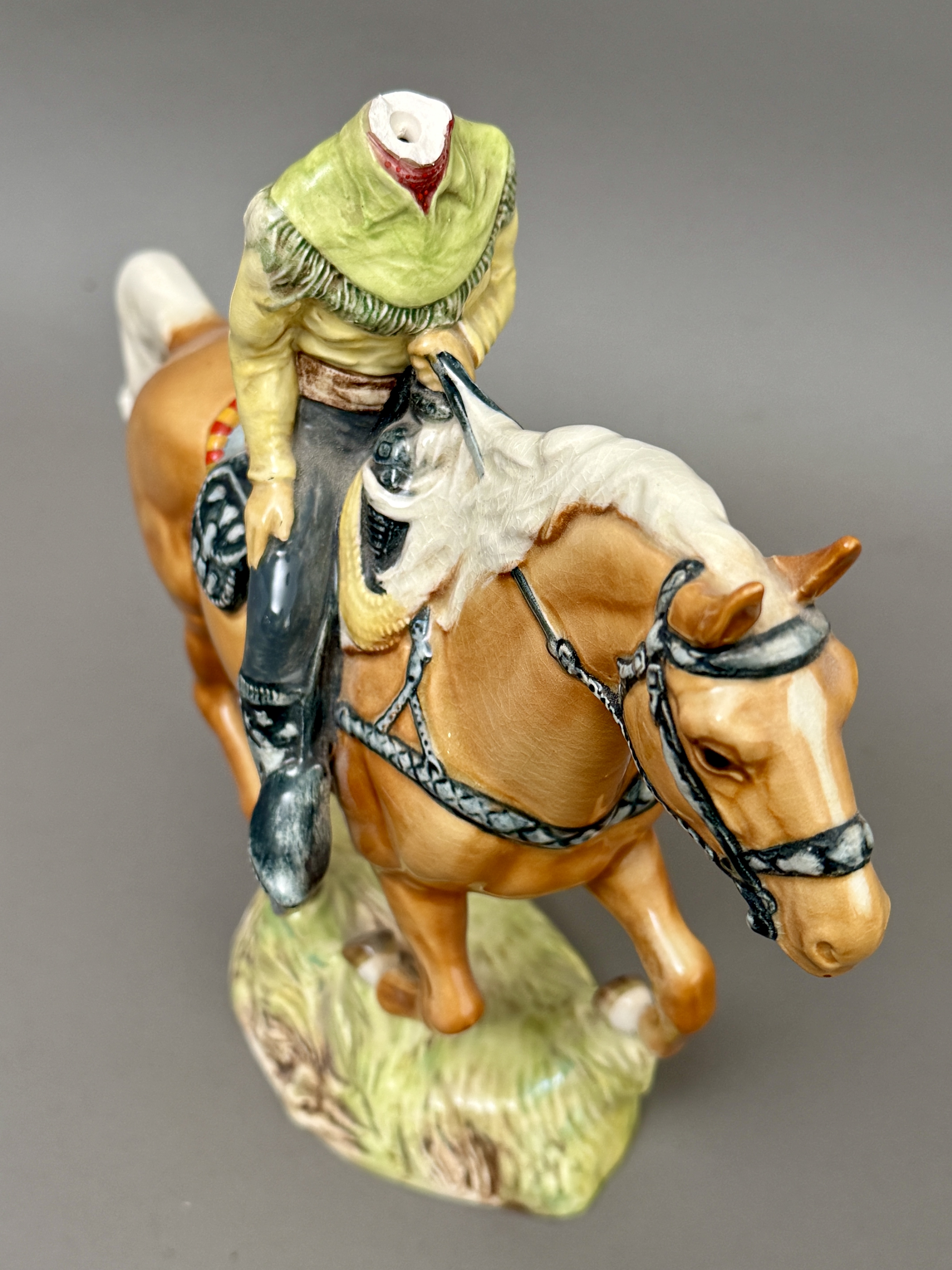 A Beswick figure of a Cowboy mounted on a palomino horse, model 1377 ...