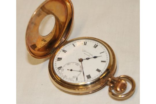 A gentlemans half hunter pocket watch by Bravingtons in gold-plated case