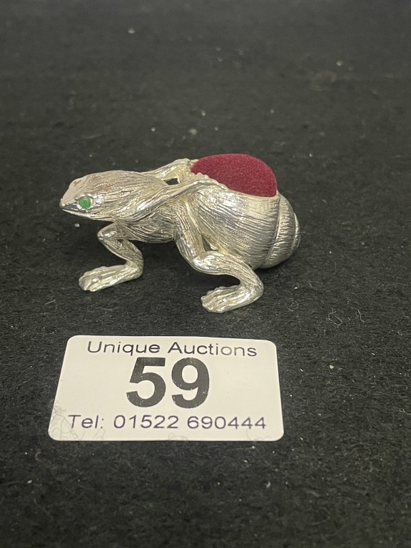 A frog style pin cushion