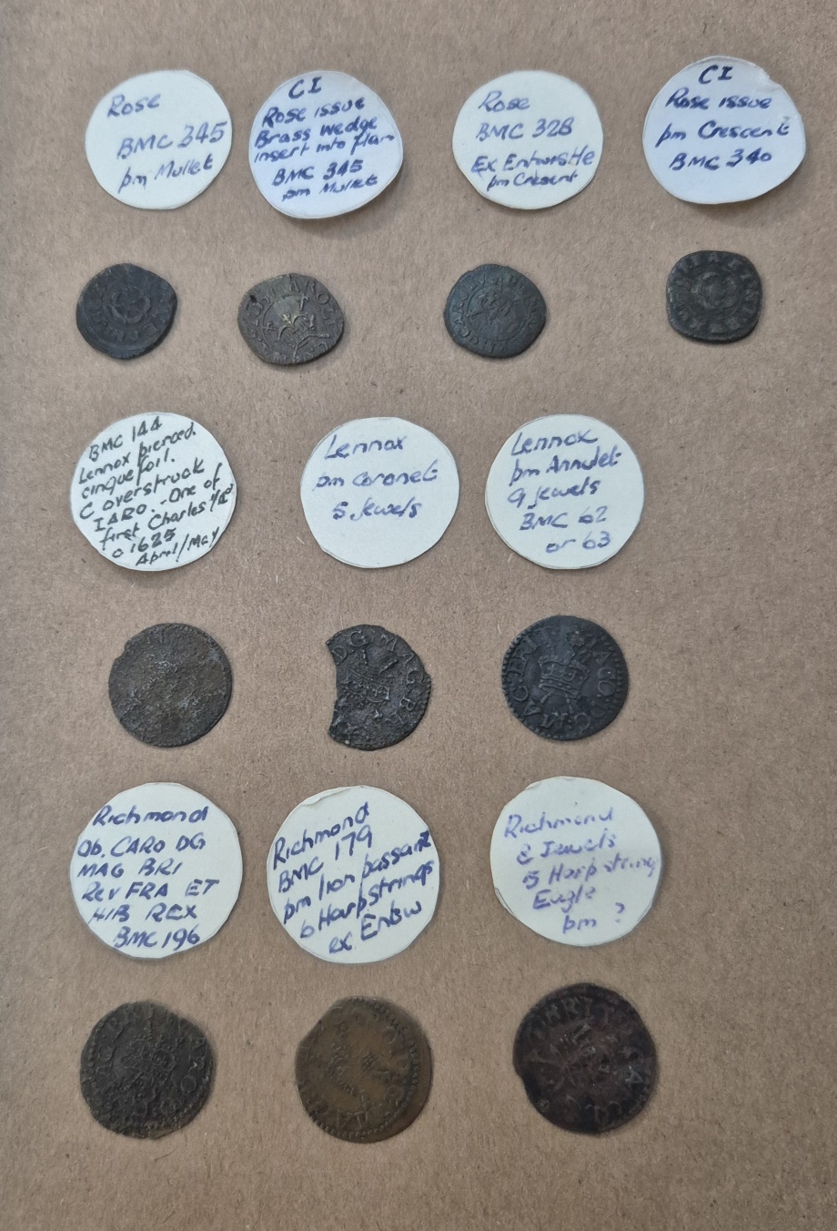 A group of ten assorted hammered coins.