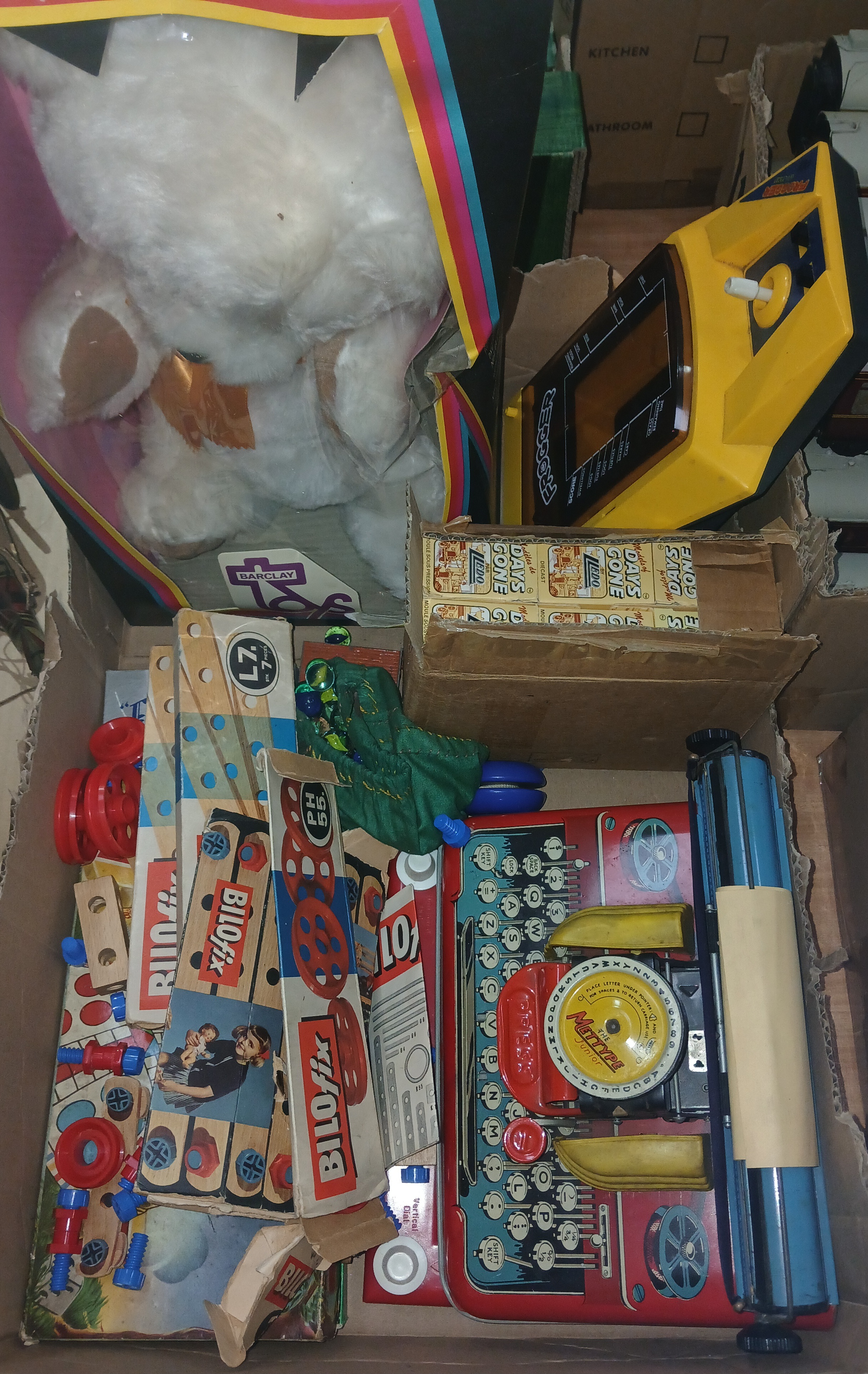 A box of assorted vintage toys to include a Chad Valley Chiltern teddy ...