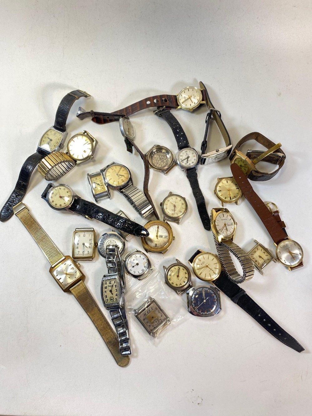 A large box of assorted wrist watches