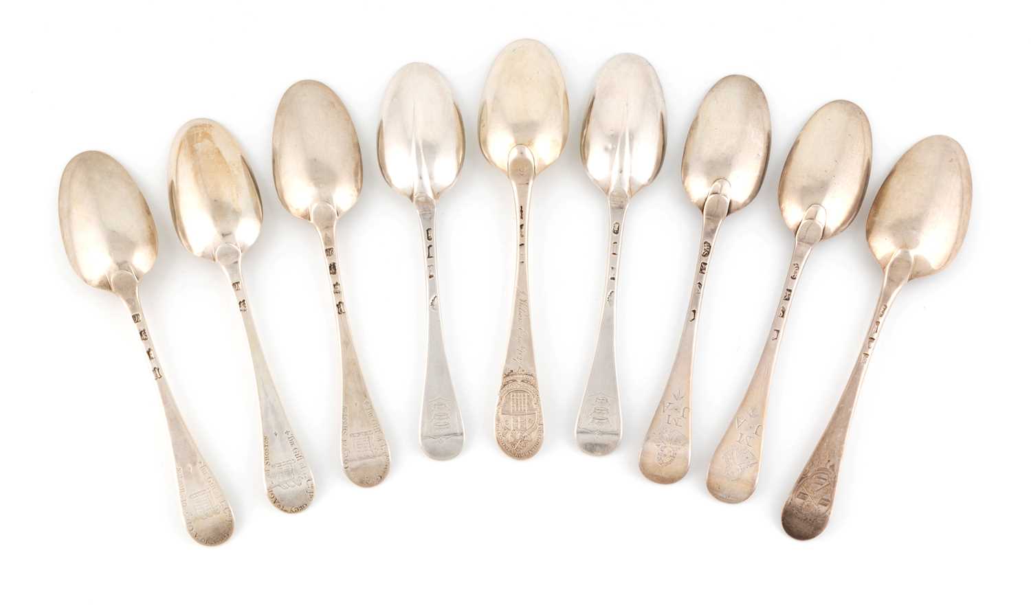 A collection of nine 18th century silver Hanoverian pattern tablespoons ...