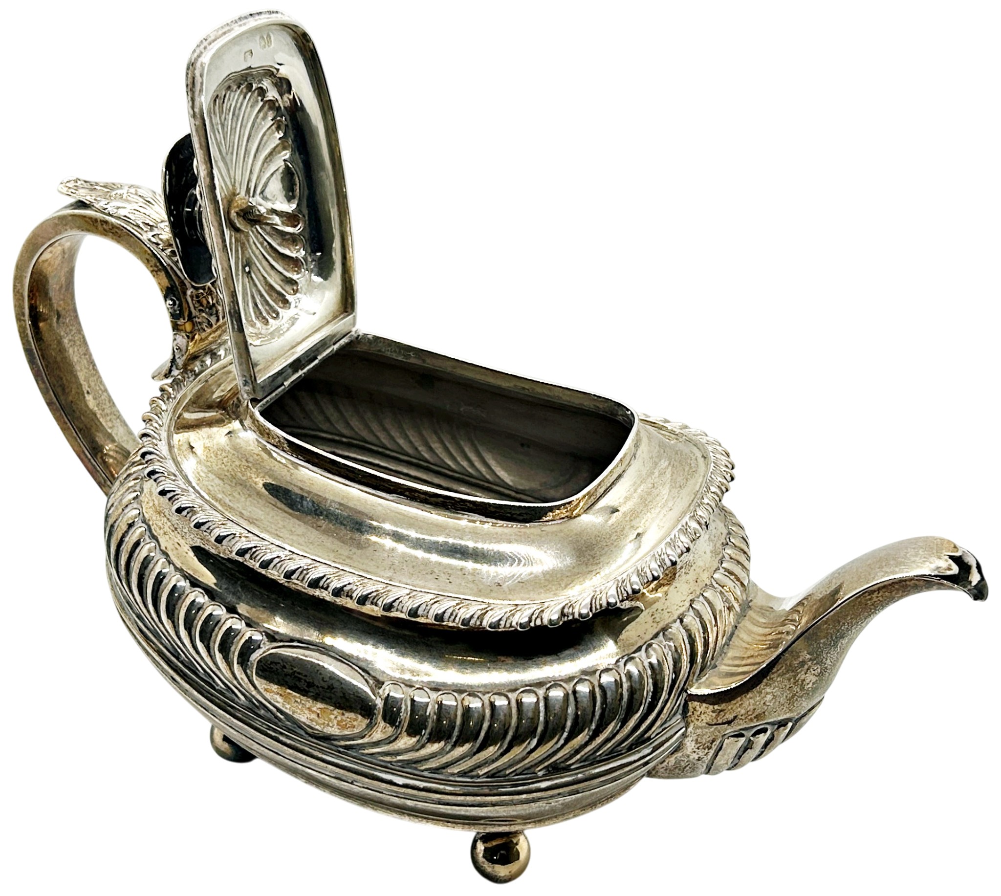 A George IV silver teapot, London, 1824 by Hester Bateman, the oval ...