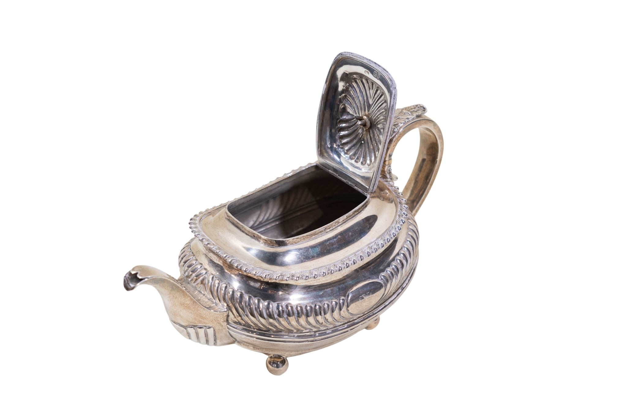 A George IV silver teapot, London, 1824 by Hester Bateman, the oval ...