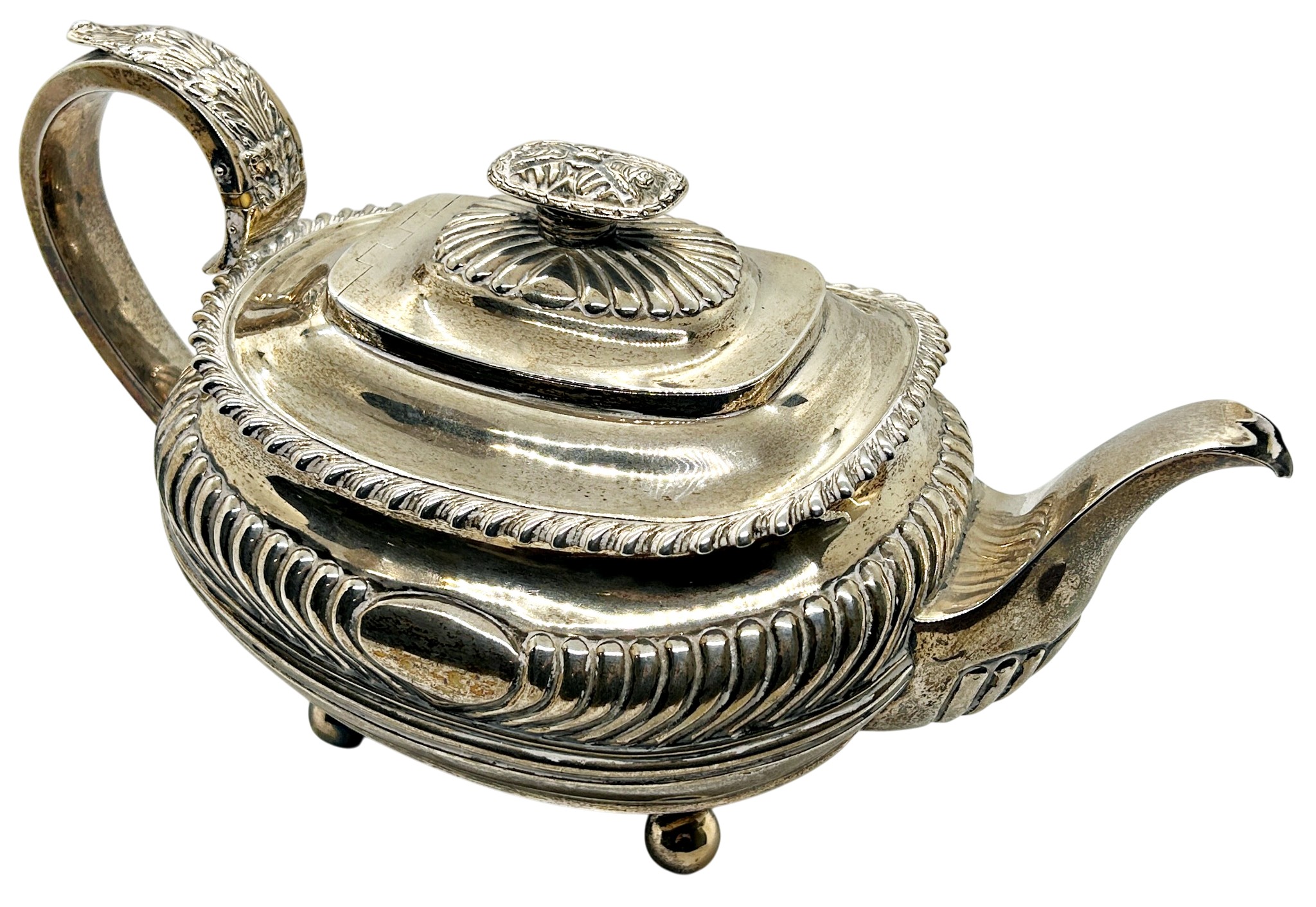 A George IV silver teapot, London, 1824 by Hester Bateman, the oval ...