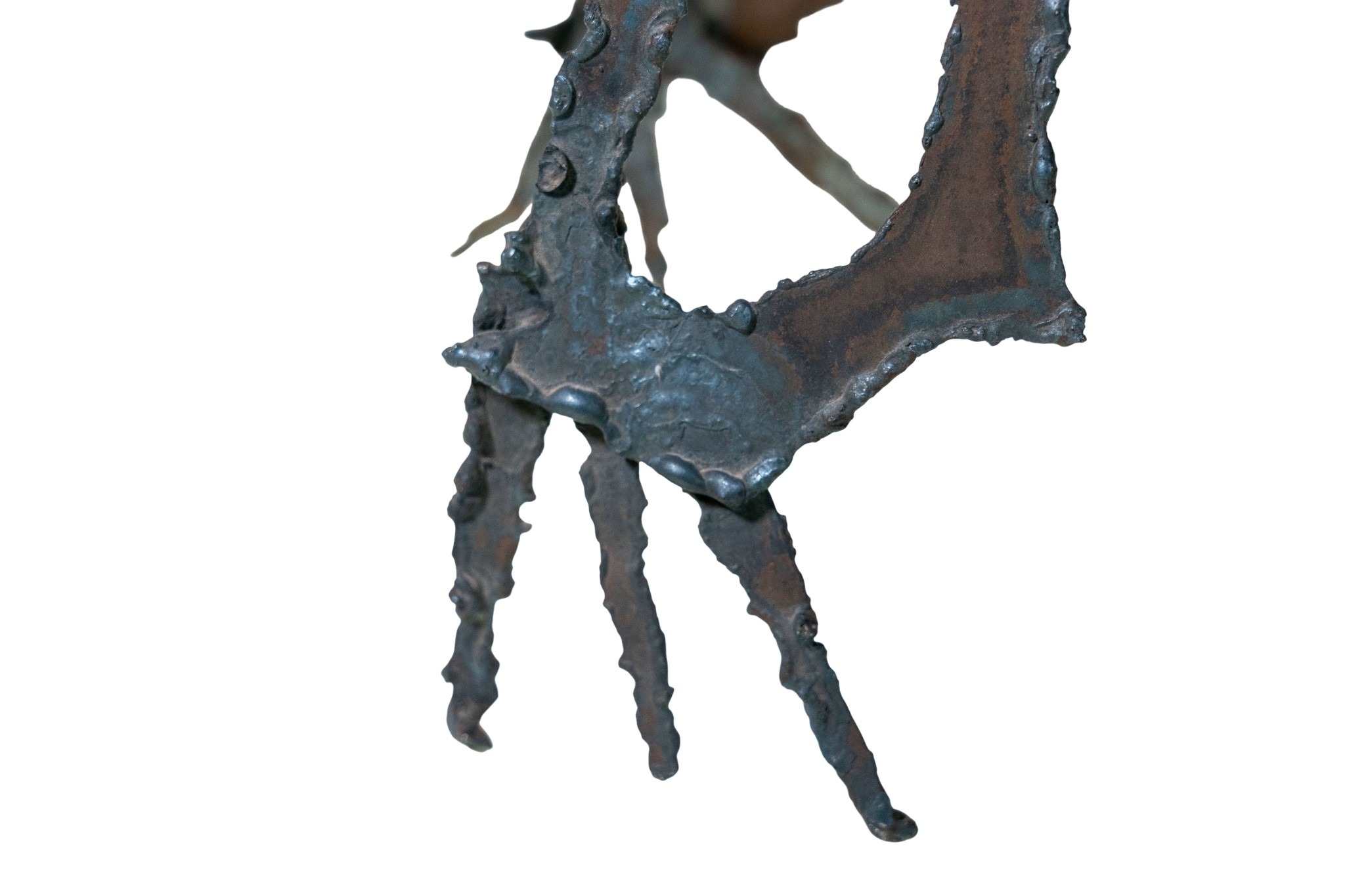 A contemporary bronzed welded and wrought metal model of a dimetrodon ...