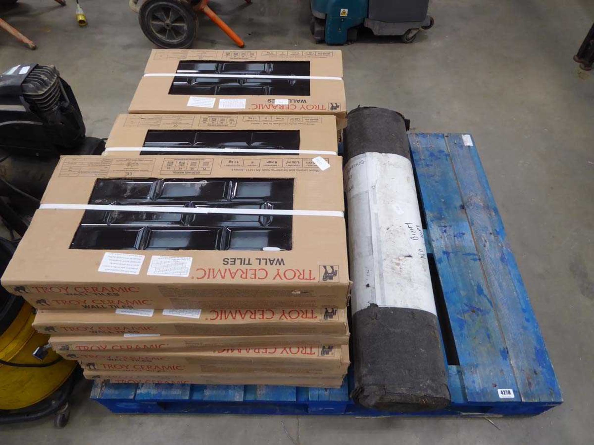 Pallet containing multiple boxes of Troy ceramic wall tiles, plus roll ...