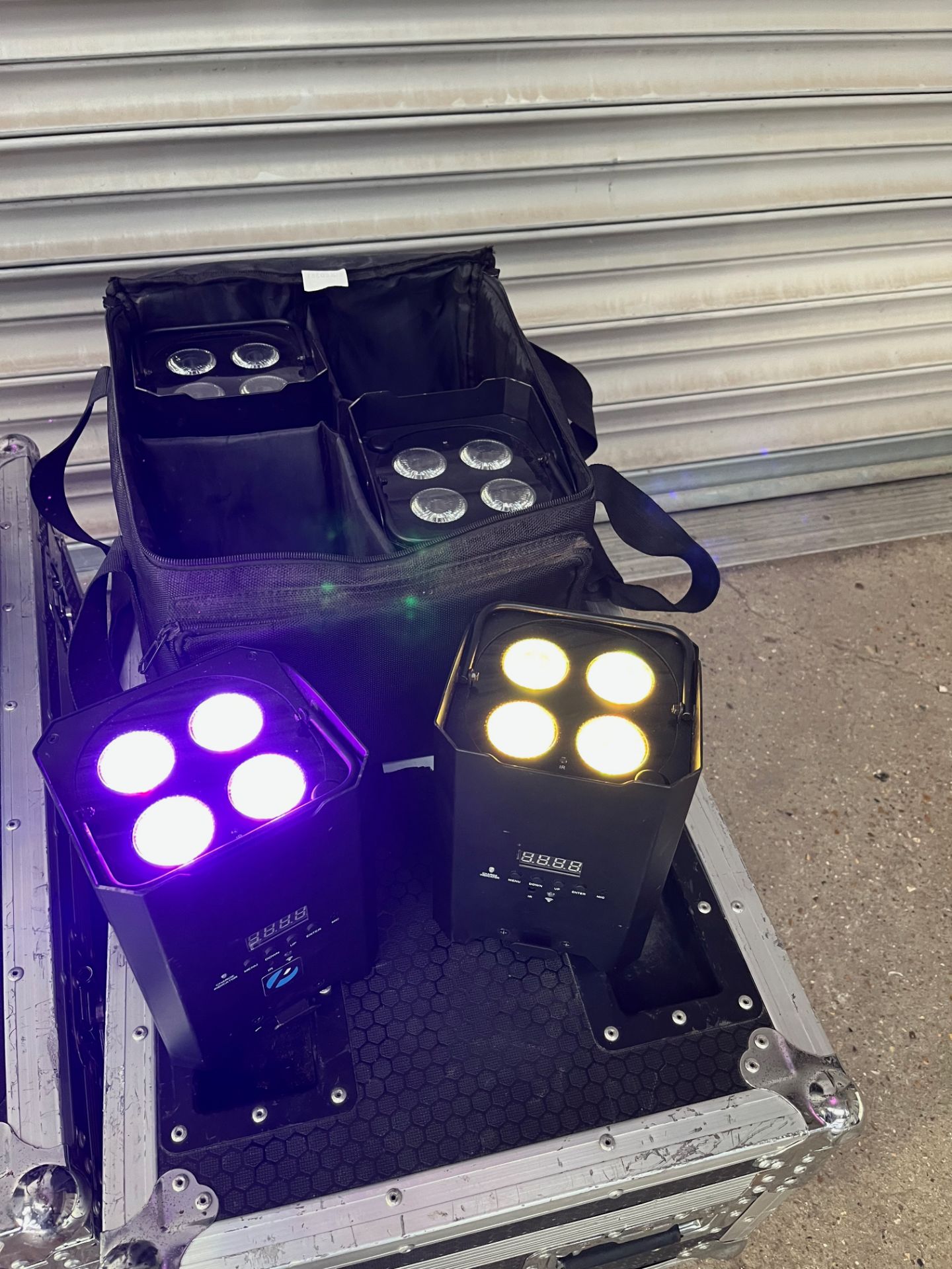 A Package of 4x wireless RGBW led uplighters supplied in flight bag and ...